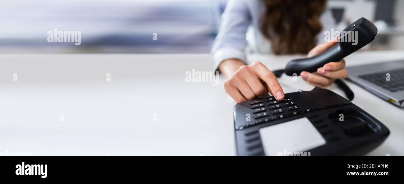 Customer Telephone Call On Landline In Service Center Office Stock ...