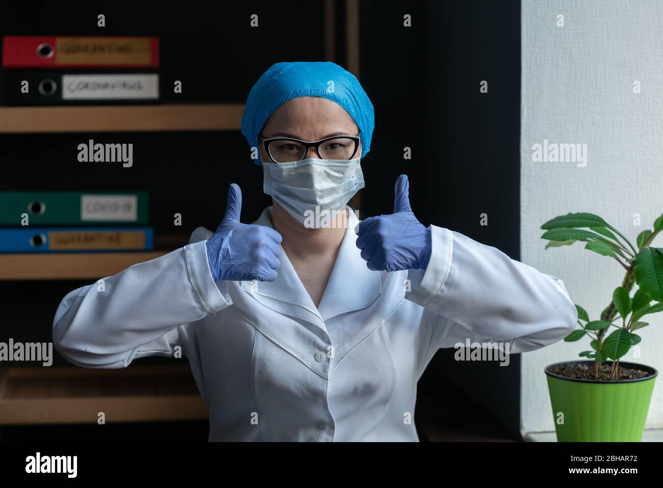 Doctor Shows GREAT Hand Sign Standing In Office Stock Photo - Alamy