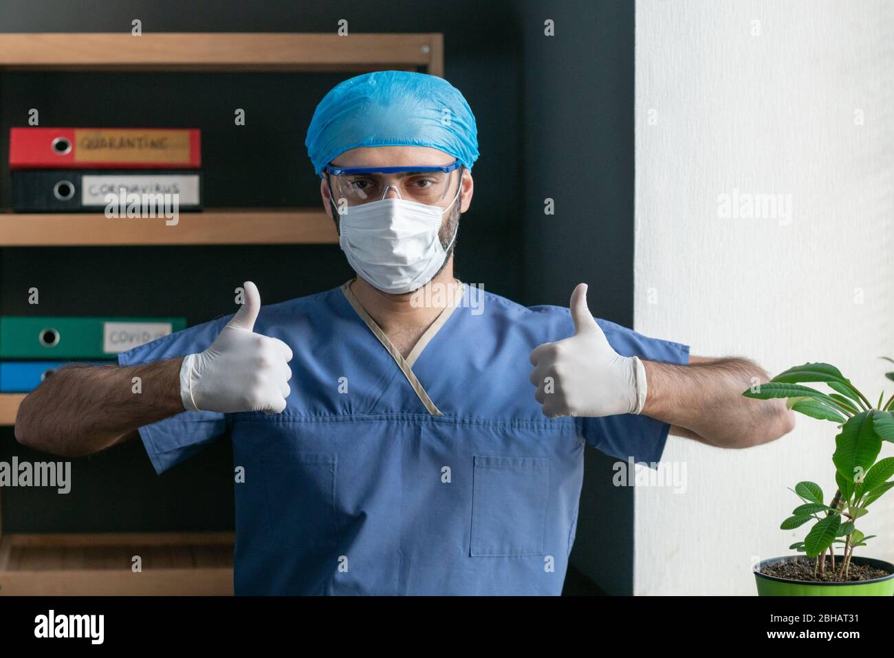 Thumb Up Sign From Male Doctor Stock Photo - Alamy