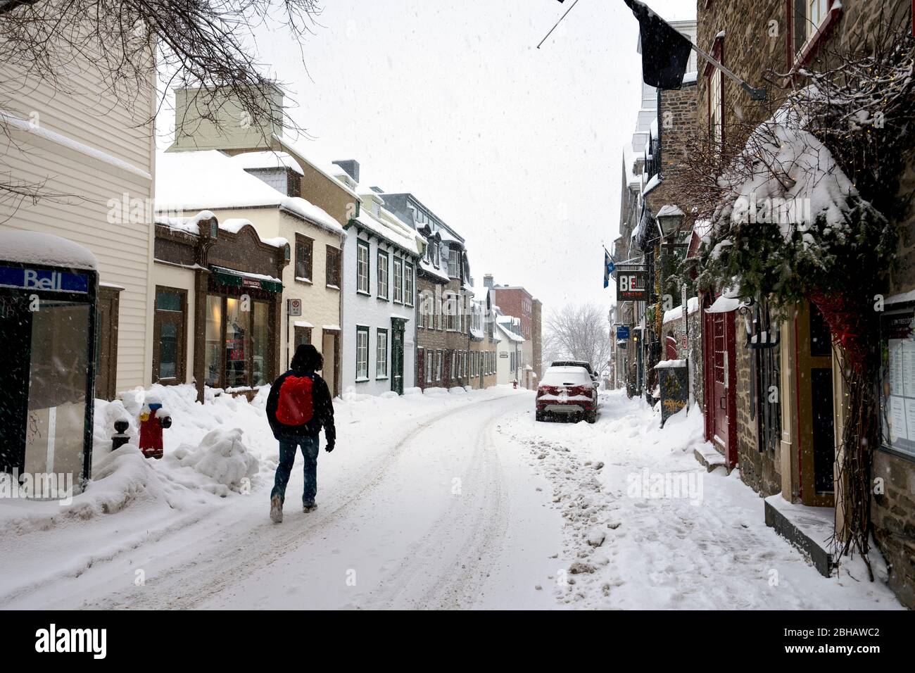 Old Quebec City street under the snow Stock Photo - Alamy