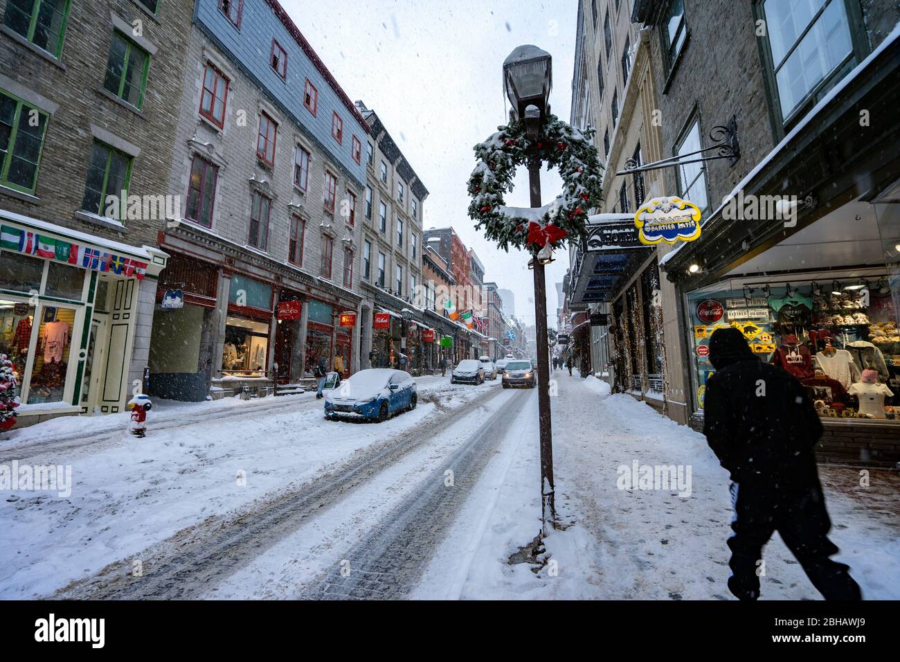 Old Quebec City street under the snow Stock Photo - Alamy