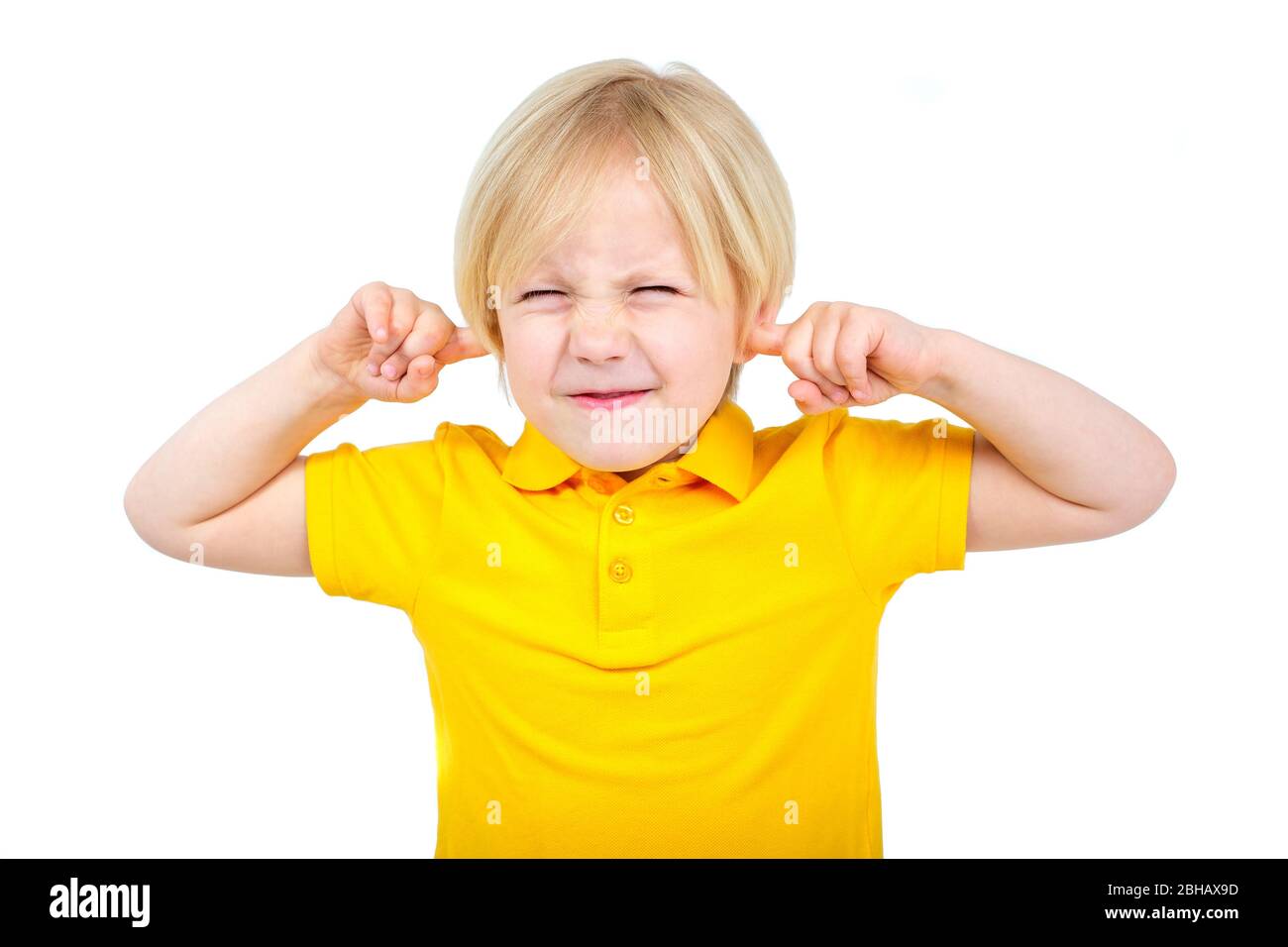 Boy plugging his ears hi-res stock photography and images - Alamy