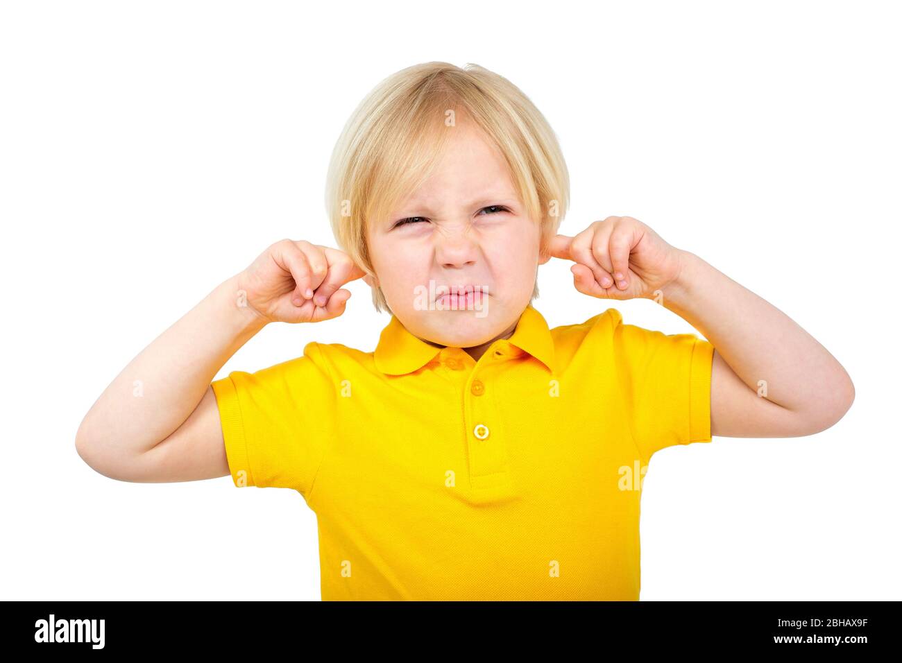 Boy plugging his ears hi-res stock photography and images - Alamy