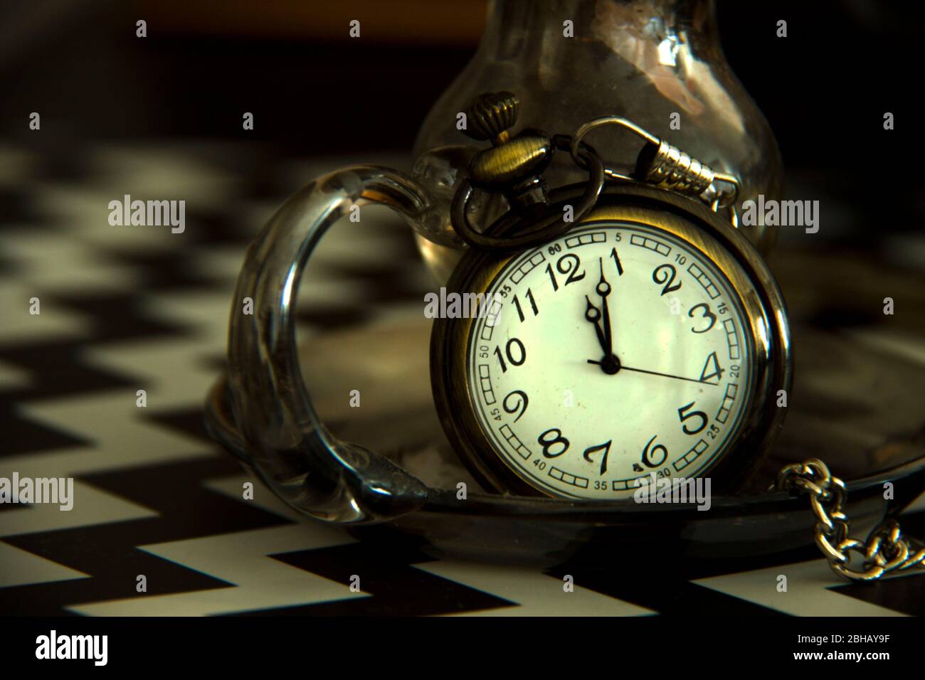 Old watch on vintage background Stock Photo - Alamy