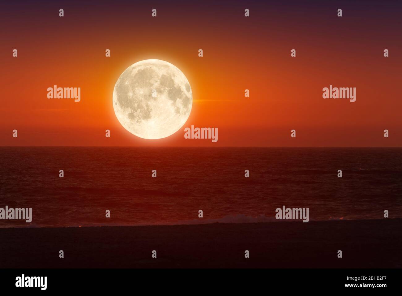 Sunset with moon hi-res stock photography and images - Alamy