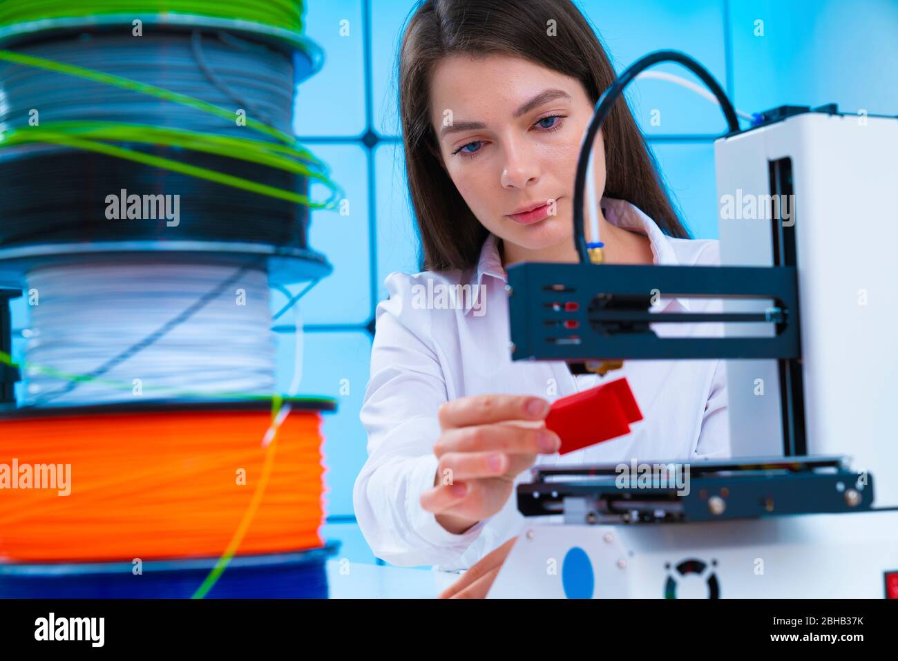 Woman using 3d printer Stock Photo - Alamy
