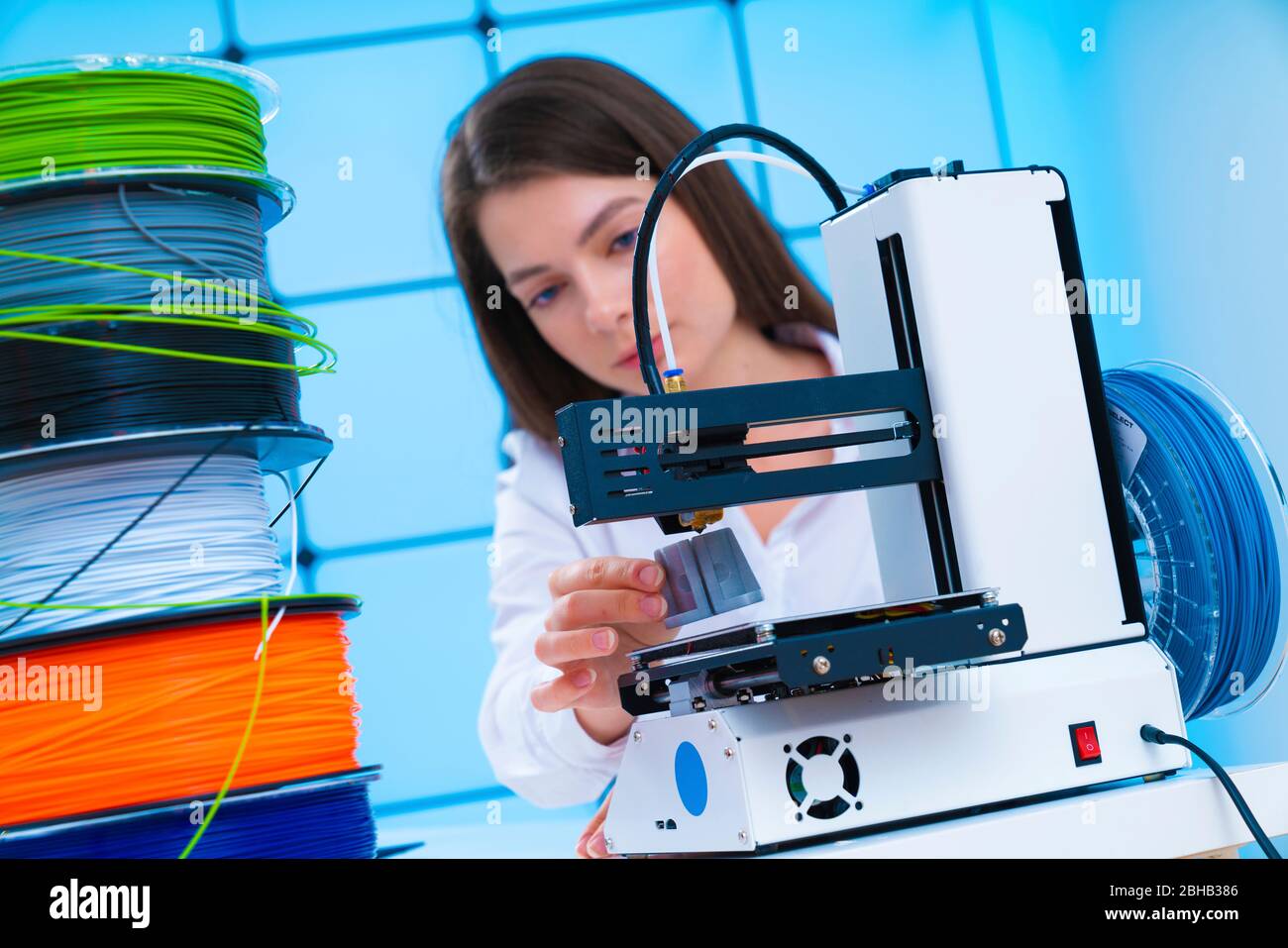 Woman using 3d printer Stock Photo - Alamy