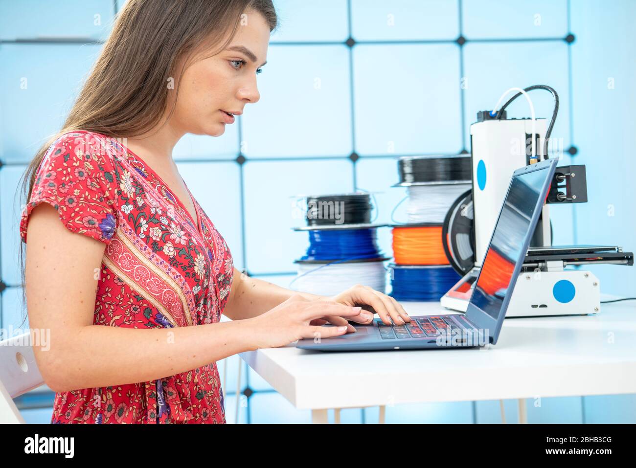 Woman using 3d printer Stock Photo - Alamy