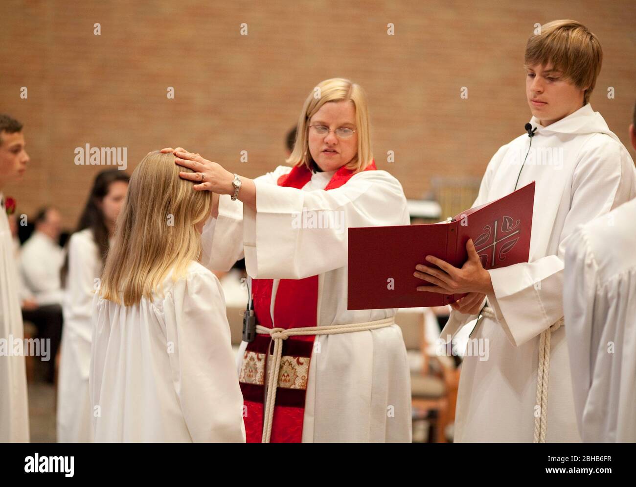 Female pastor baptism hi-res stock photography and images - Alamy