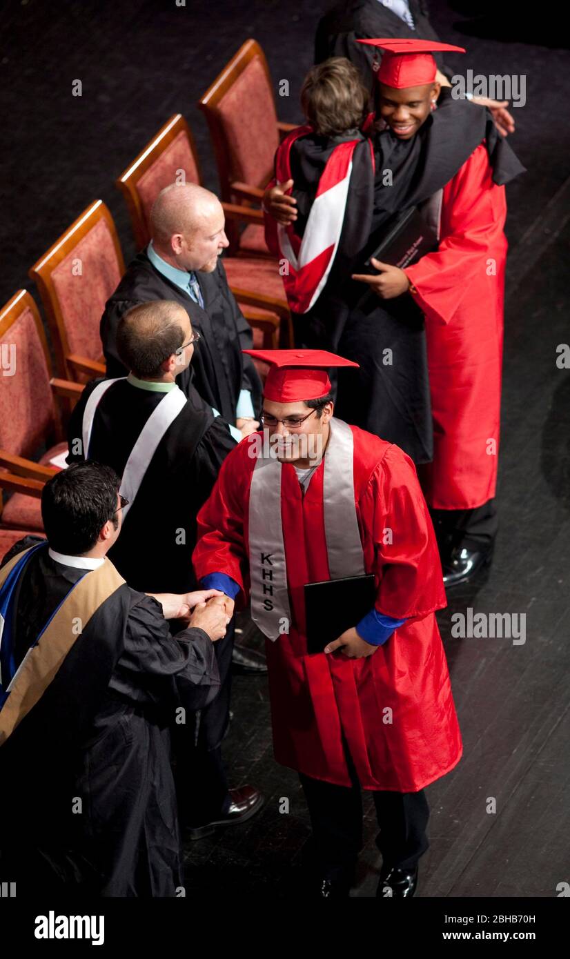 Graduates walk across stage hi-res stock photography and images - Alamy