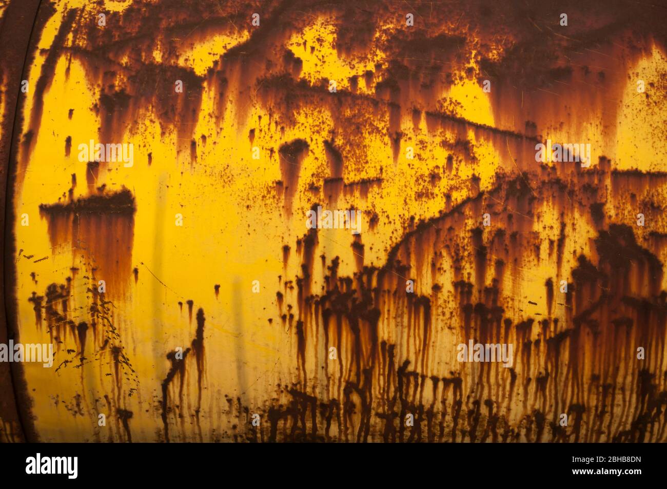 Large, yellow, rusty tank close up. Rusty background,abandoned ...