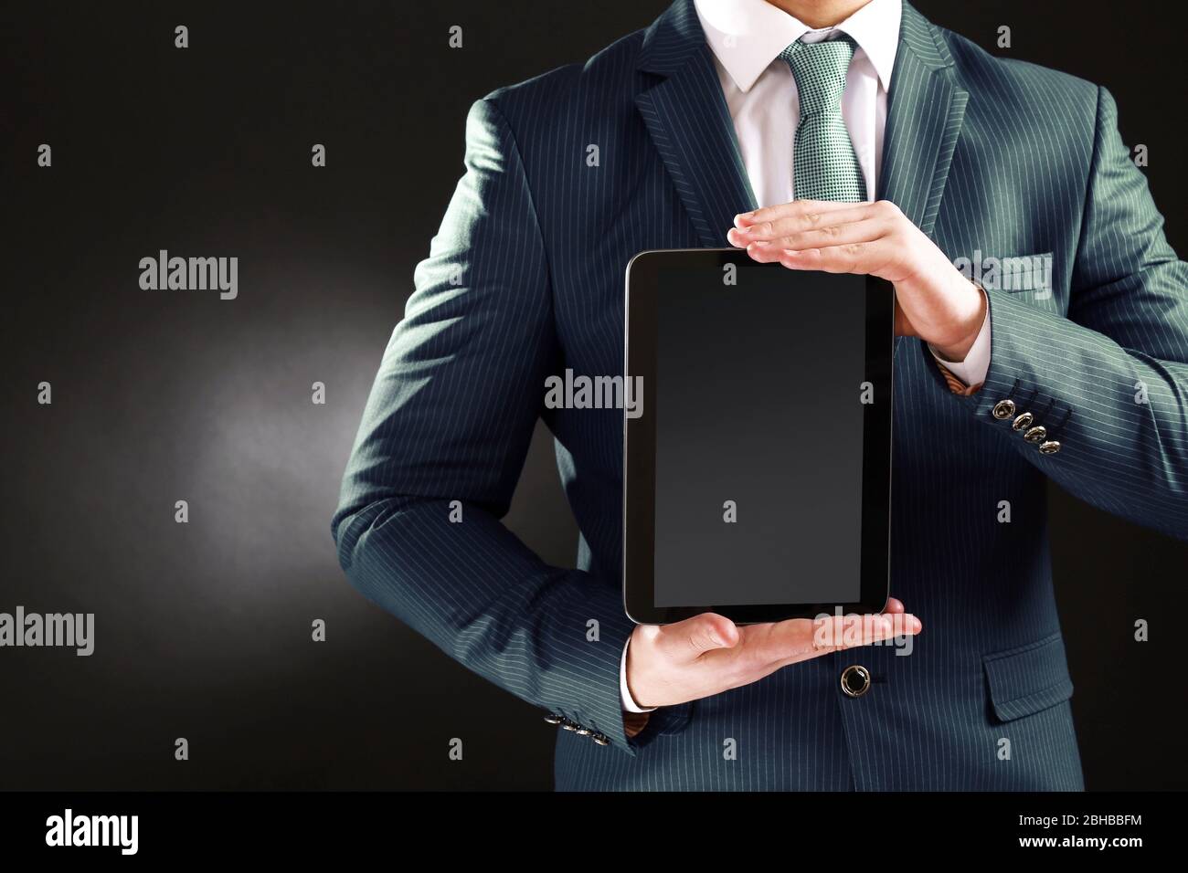 Male hand with tablet close-up Stock Photo - Alamy