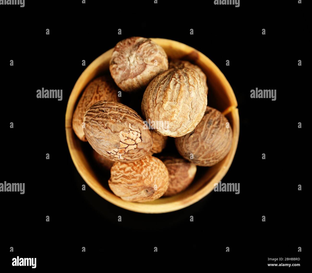 Nutmeg in white bowl close hi-res stock photography and images - Alamy