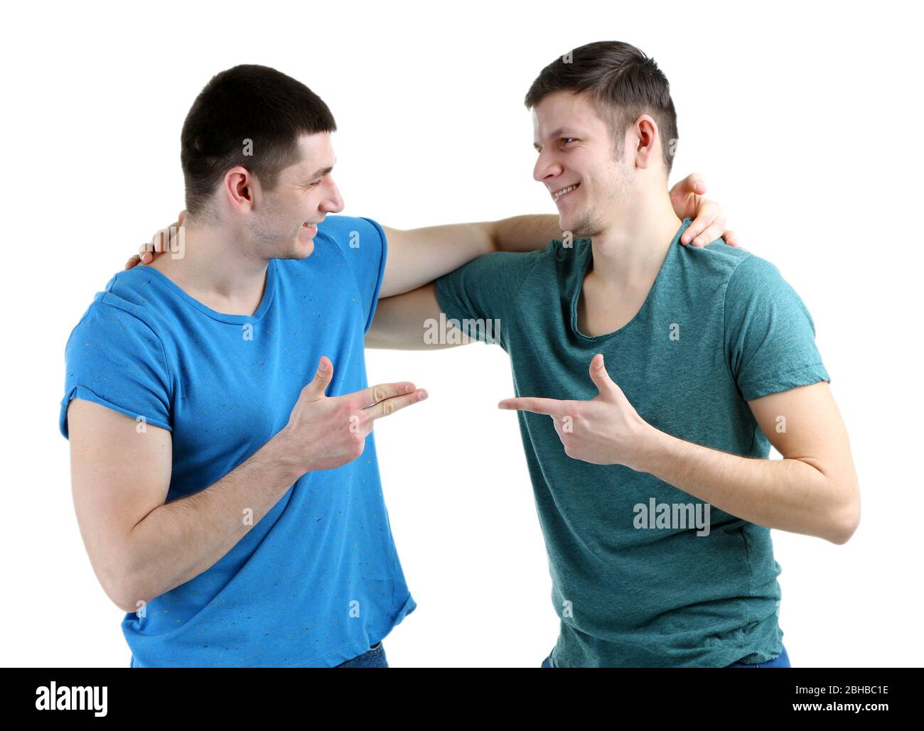 Two handsome young men isolated on white Stock Photo - Alamy