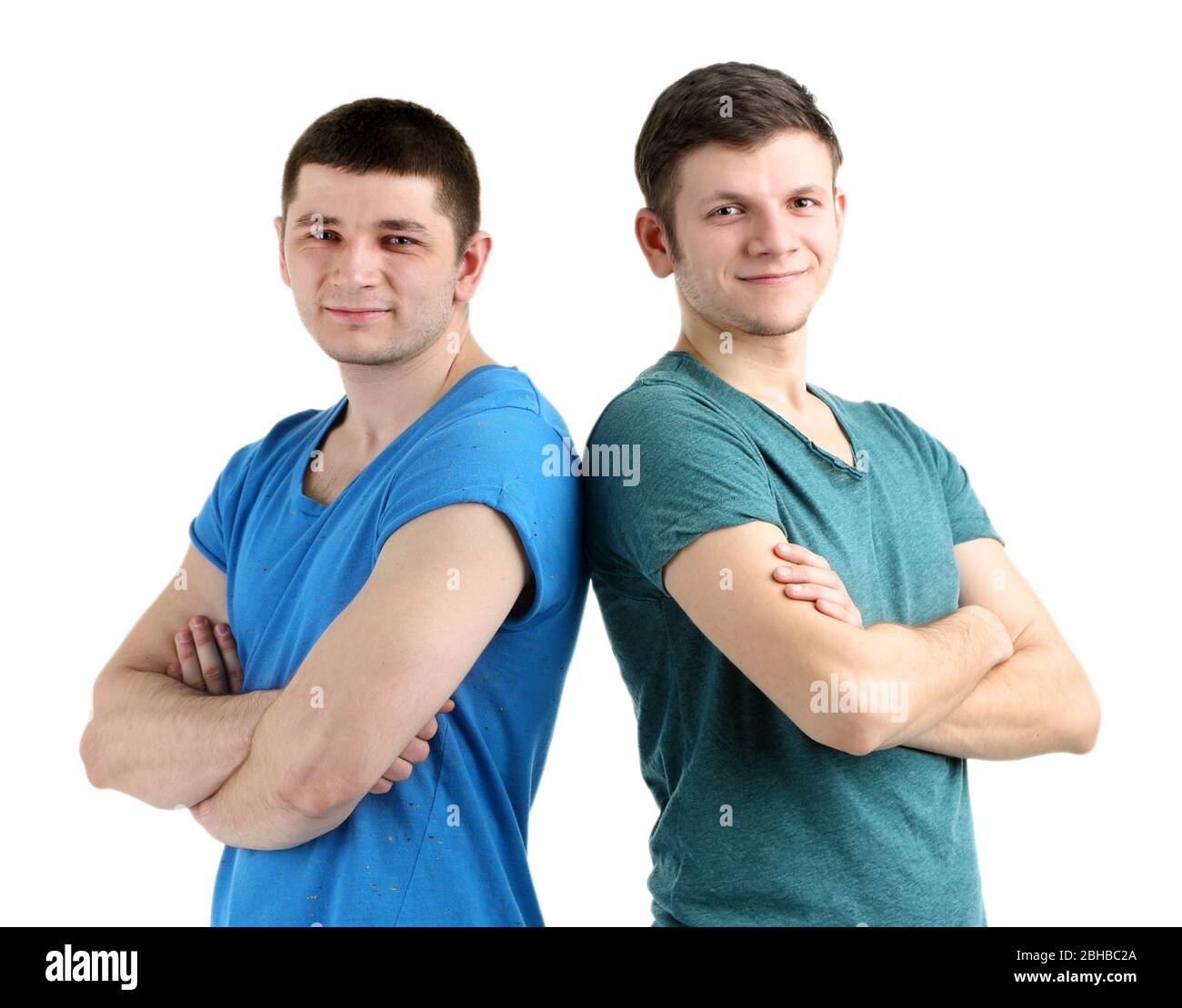 Two handsome young men isolated on white Stock Photo - Alamy