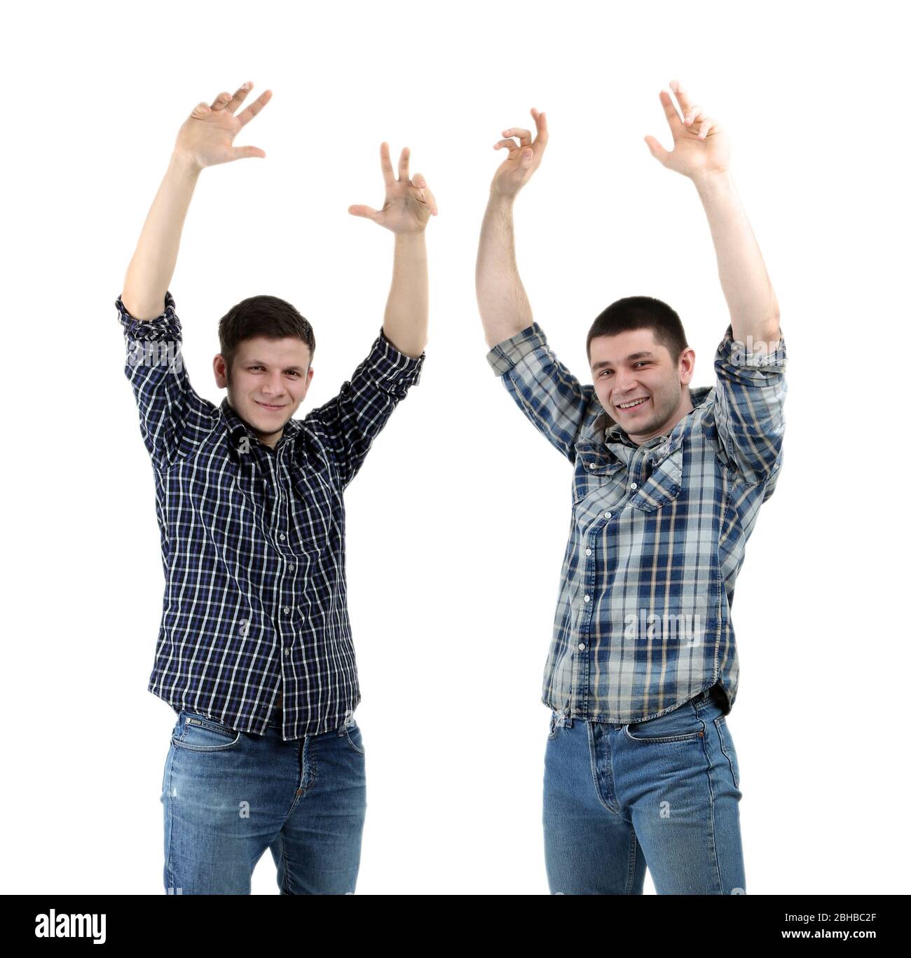 Two handsome young men isolated on white Stock Photo - Alamy