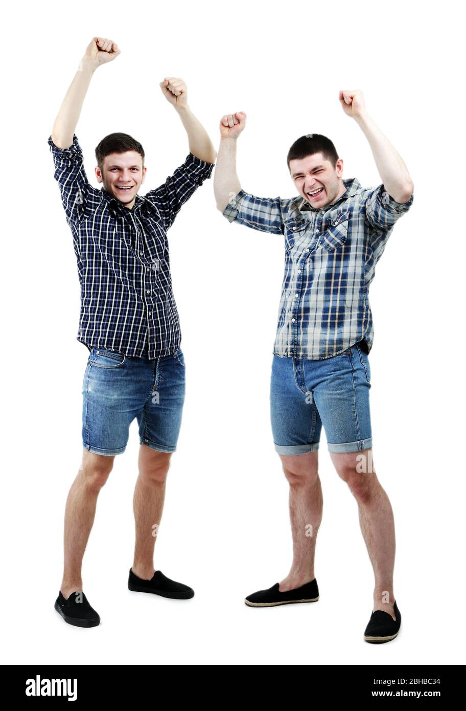 Two handsome young men isolated on white Stock Photo - Alamy