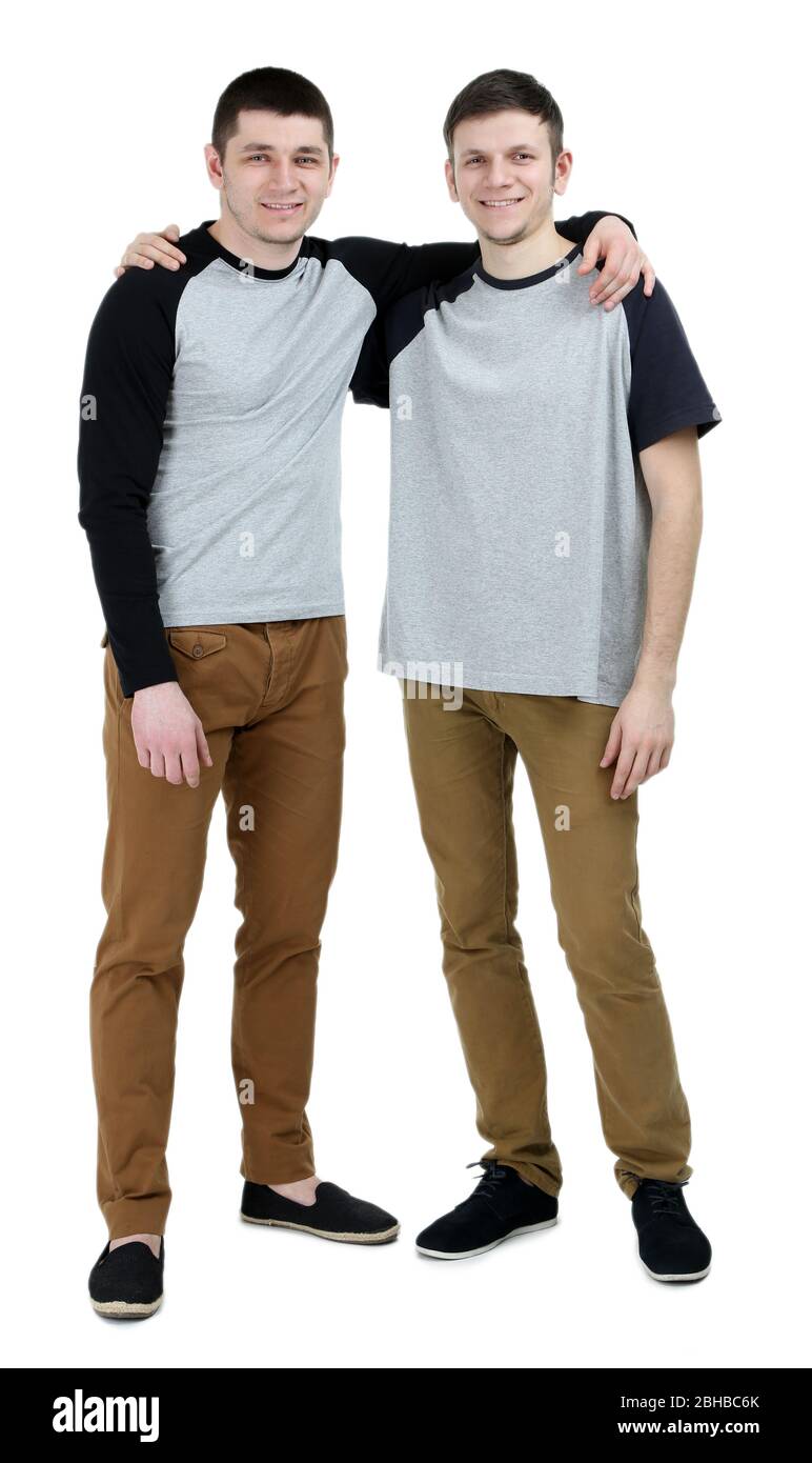 Two handsome young men isolated on white Stock Photo - Alamy