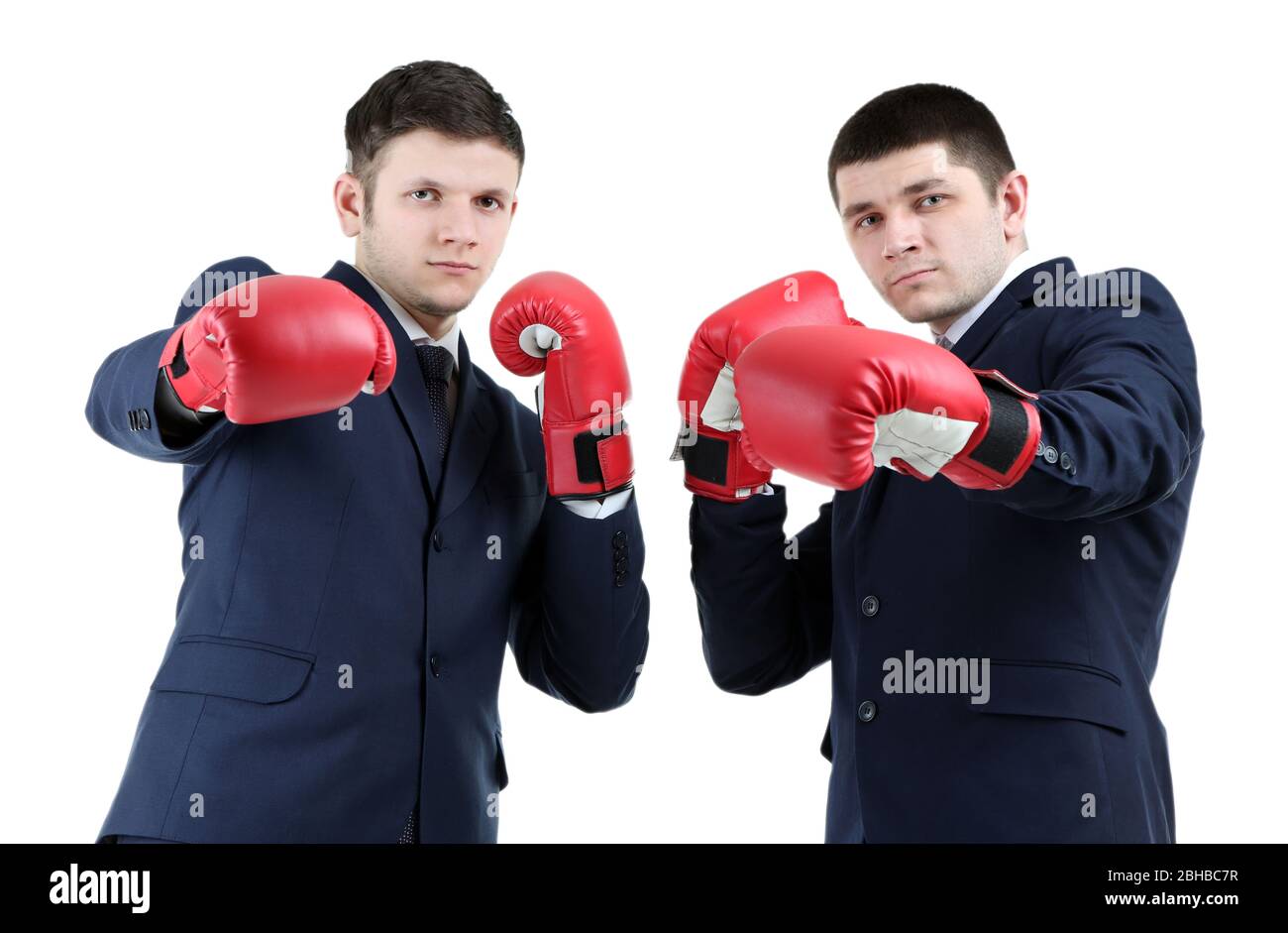 Two handsome businessmen with boxing gloves isolated on white Stock ...