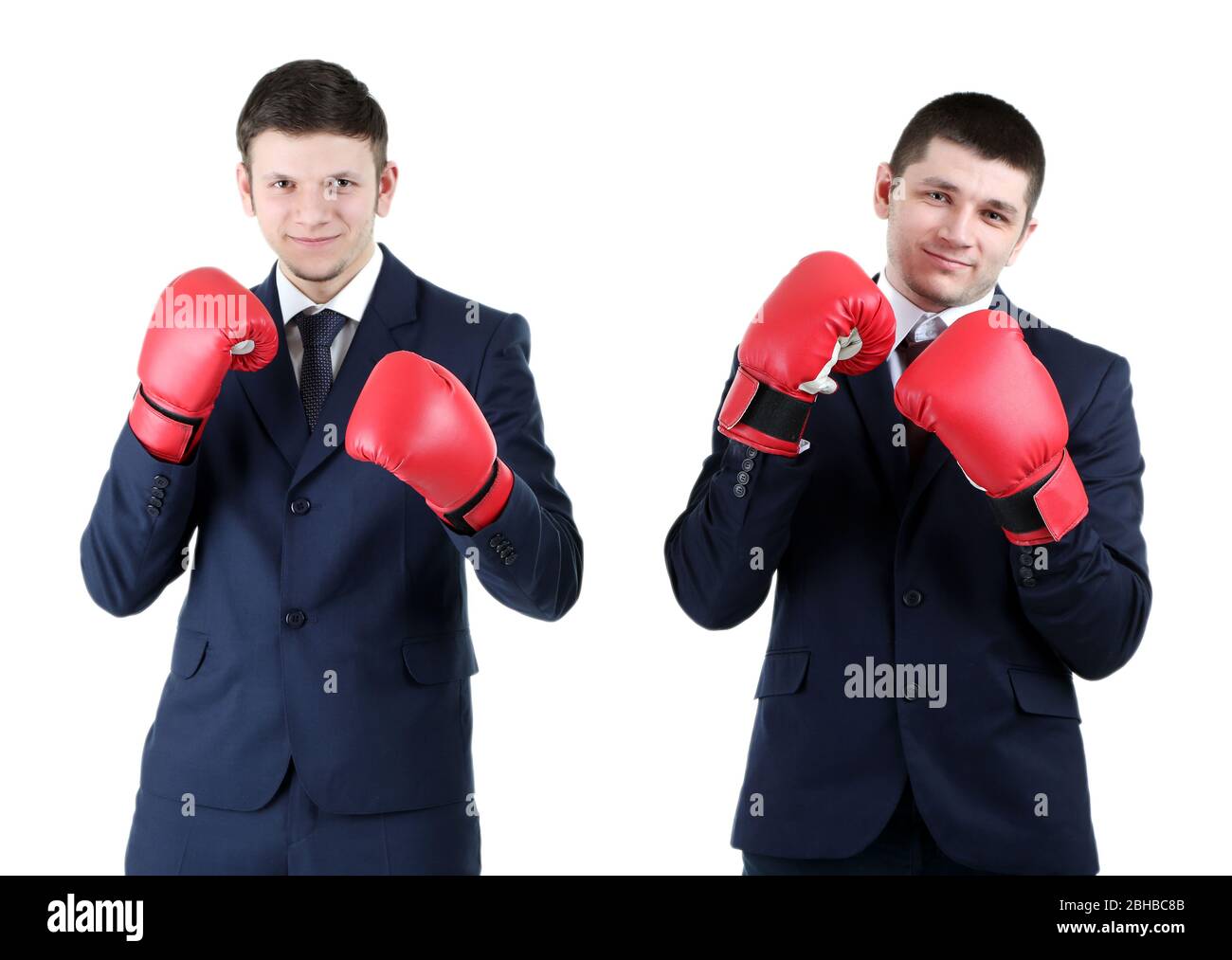 Two handsome businessmen with boxing gloves isolated on white Stock ...