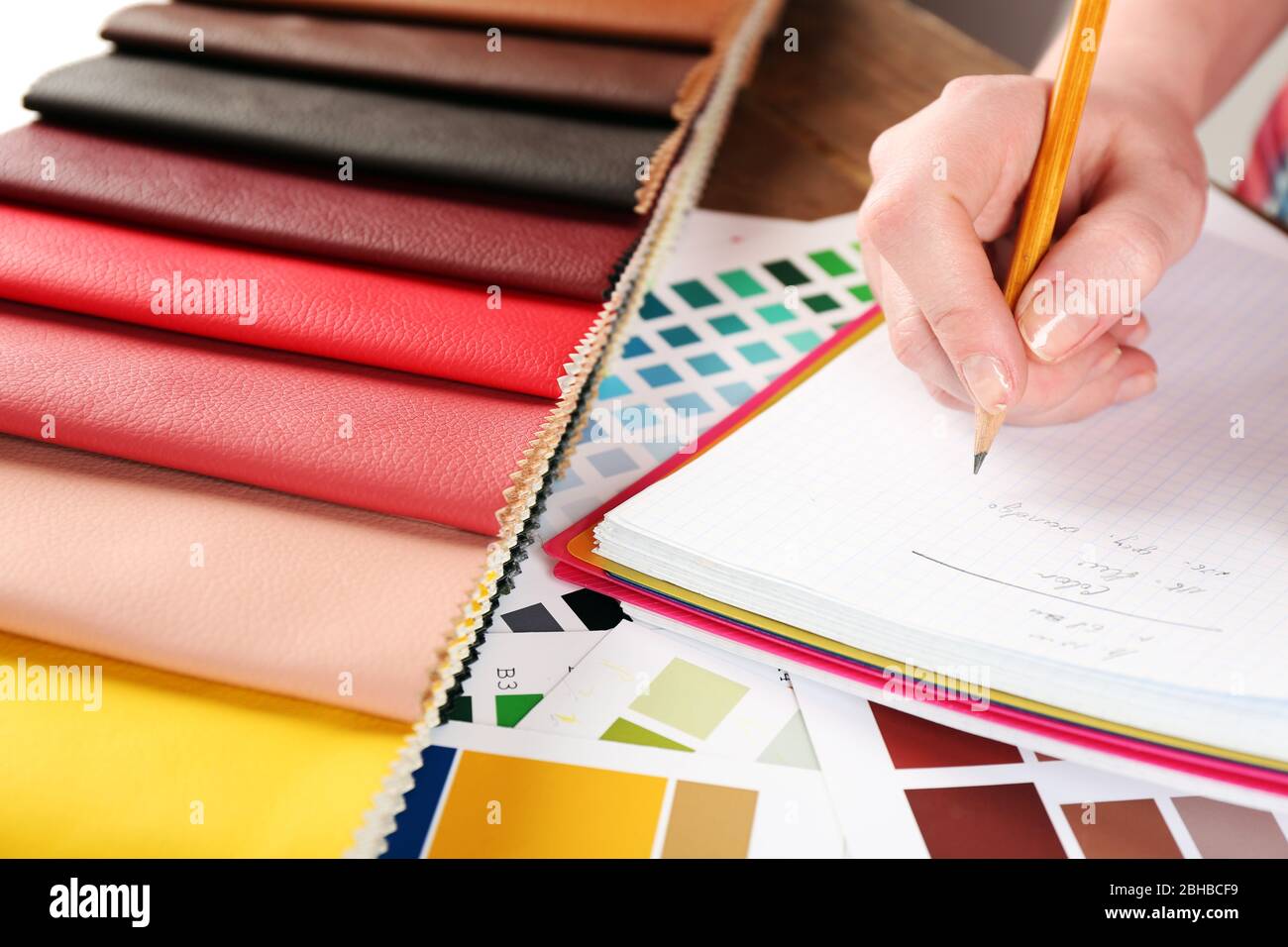 Woman working with scraps of colored tissue and palette close up Stock ...