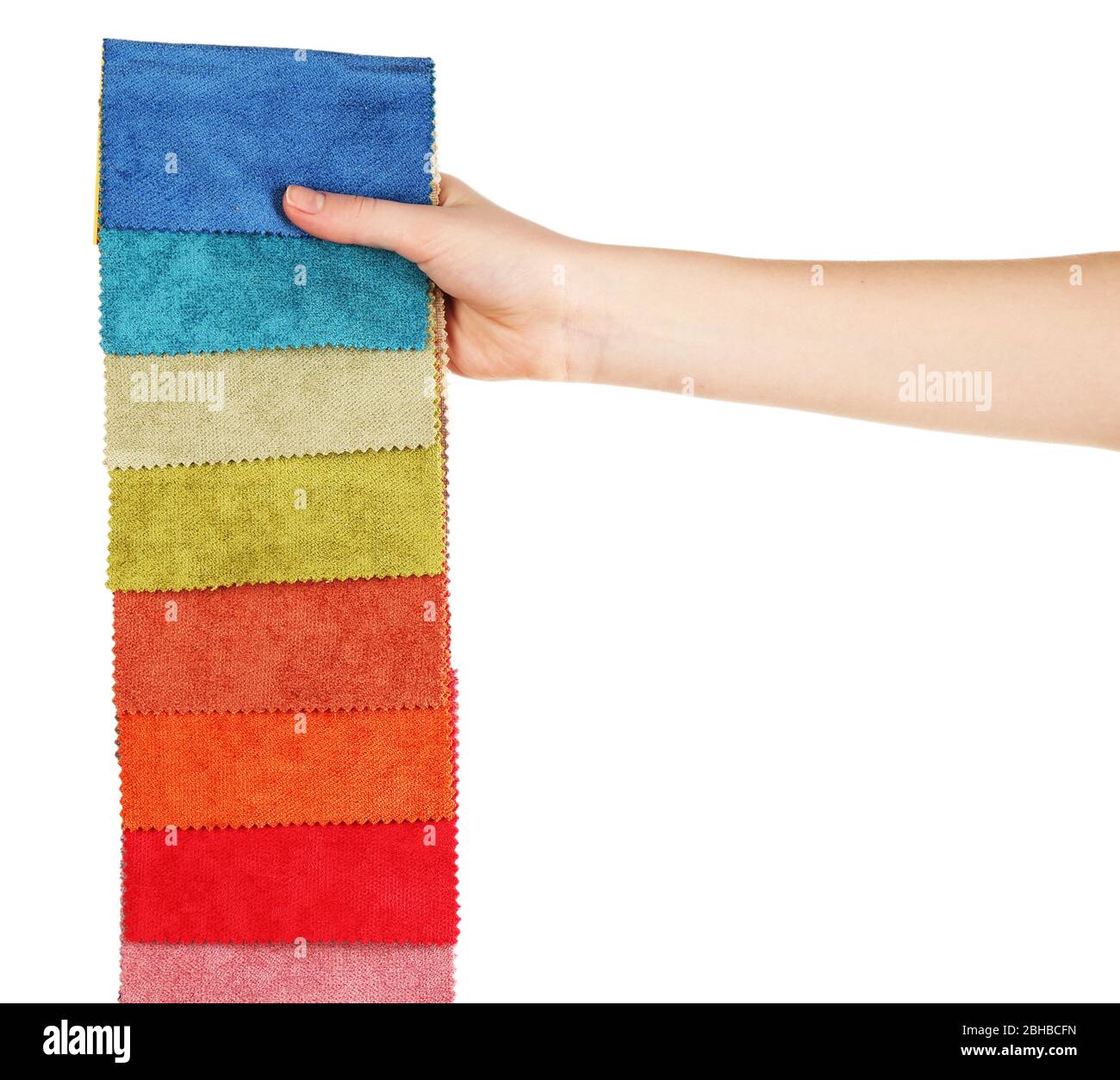 Female hand holding scraps of colored tissue isolated on white Stock ...