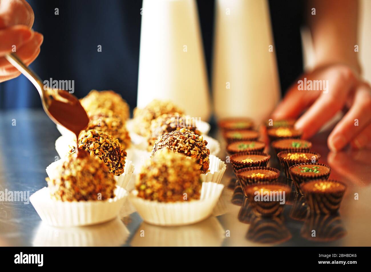 Female chocolatier making chocolate close hi-res stock photography and ...