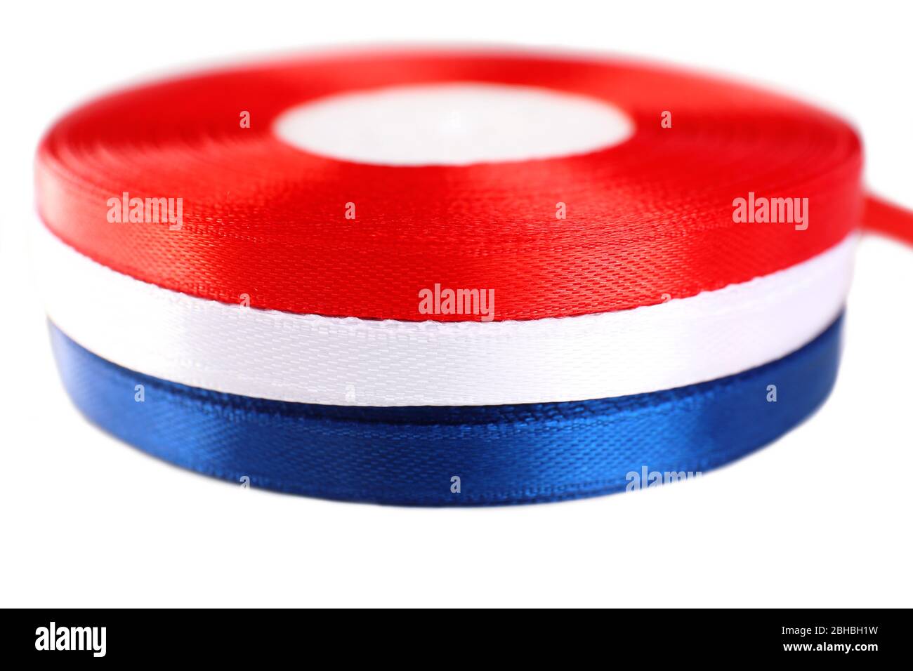 Colorful rolled ribbons on white background Stock Photo - Alamy