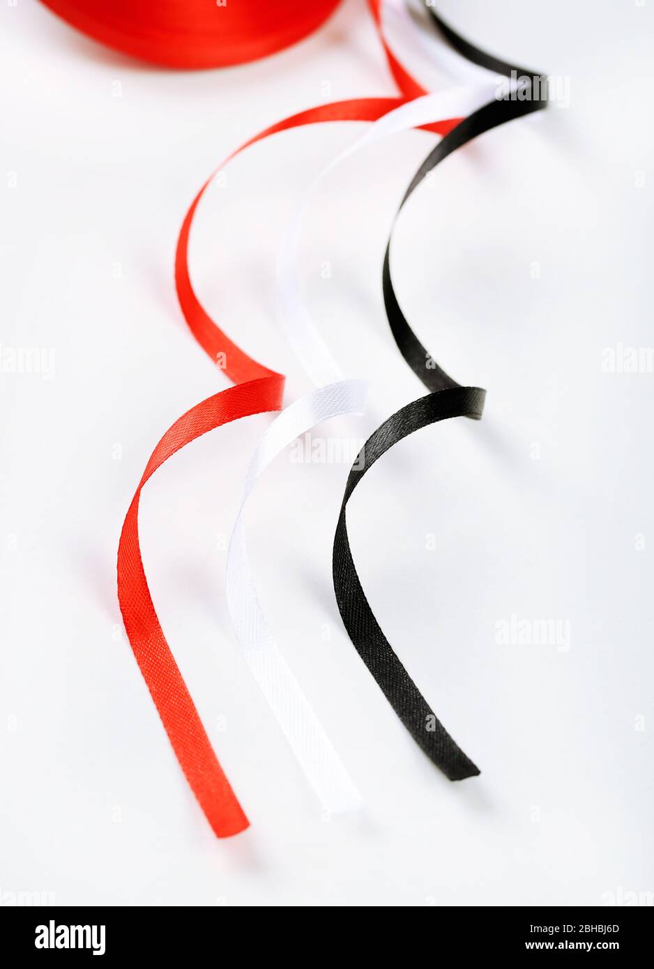 Colorful ribbons isolated on white Stock Photo - Alamy