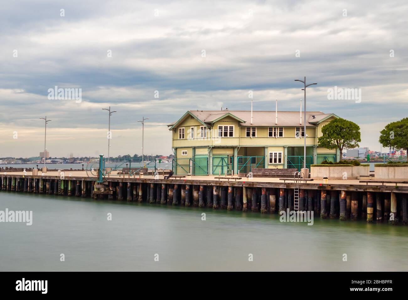 Long exposure of the Princess Pier over a cloudy dramatic at the port ...
