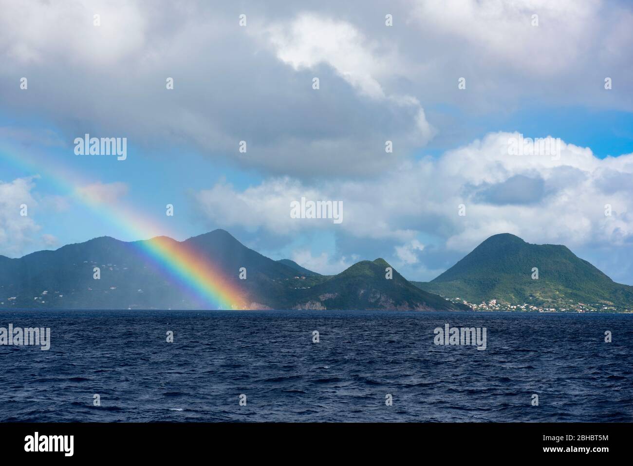 Caribbean, Lesser Antilles, Martinique. Double rainbow in front of the ...
