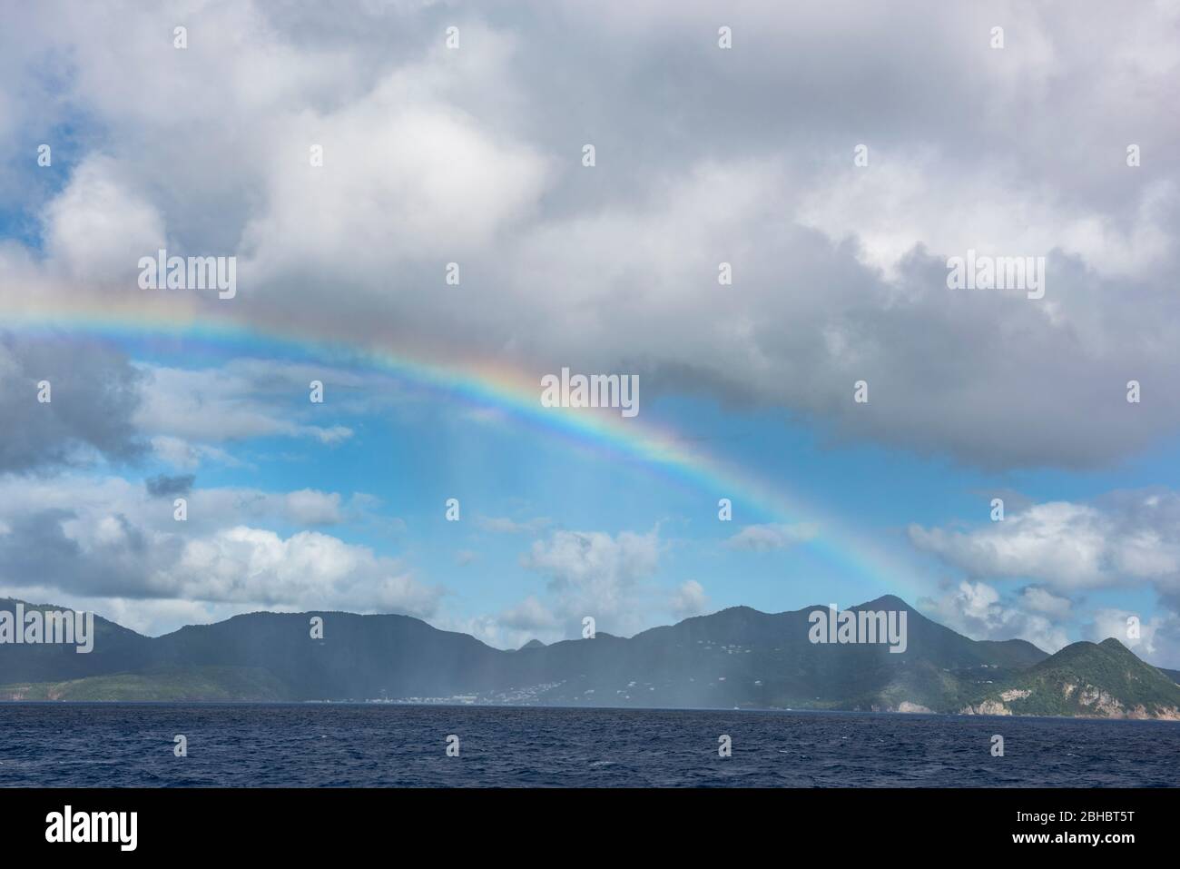 Caribbean, Lesser Antilles, Martinique. Double rainbow in front of the ...