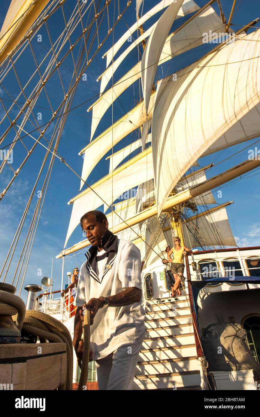 Caribbean, St .Kitts, Nevis. Sailor crew on the Star Clipper sailing ...