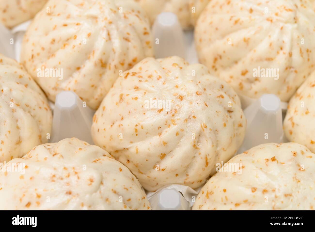 traditional Chinese buns in a package close up horizontal composition ...