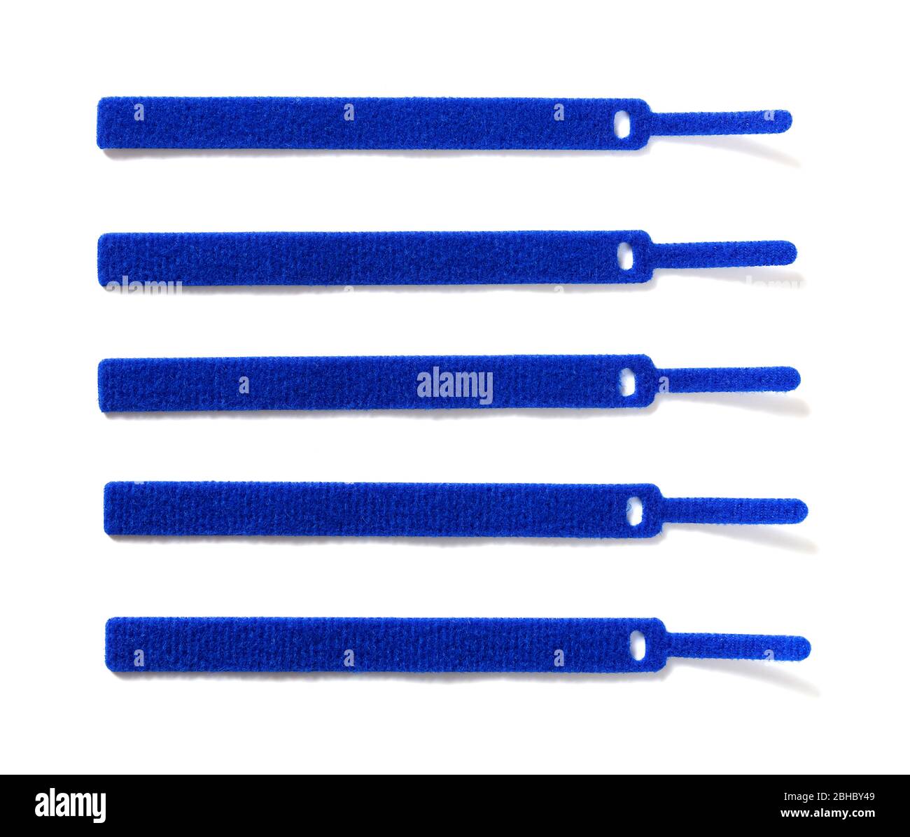 blue velcro cable ties on white background Stock Photo - Alamy
