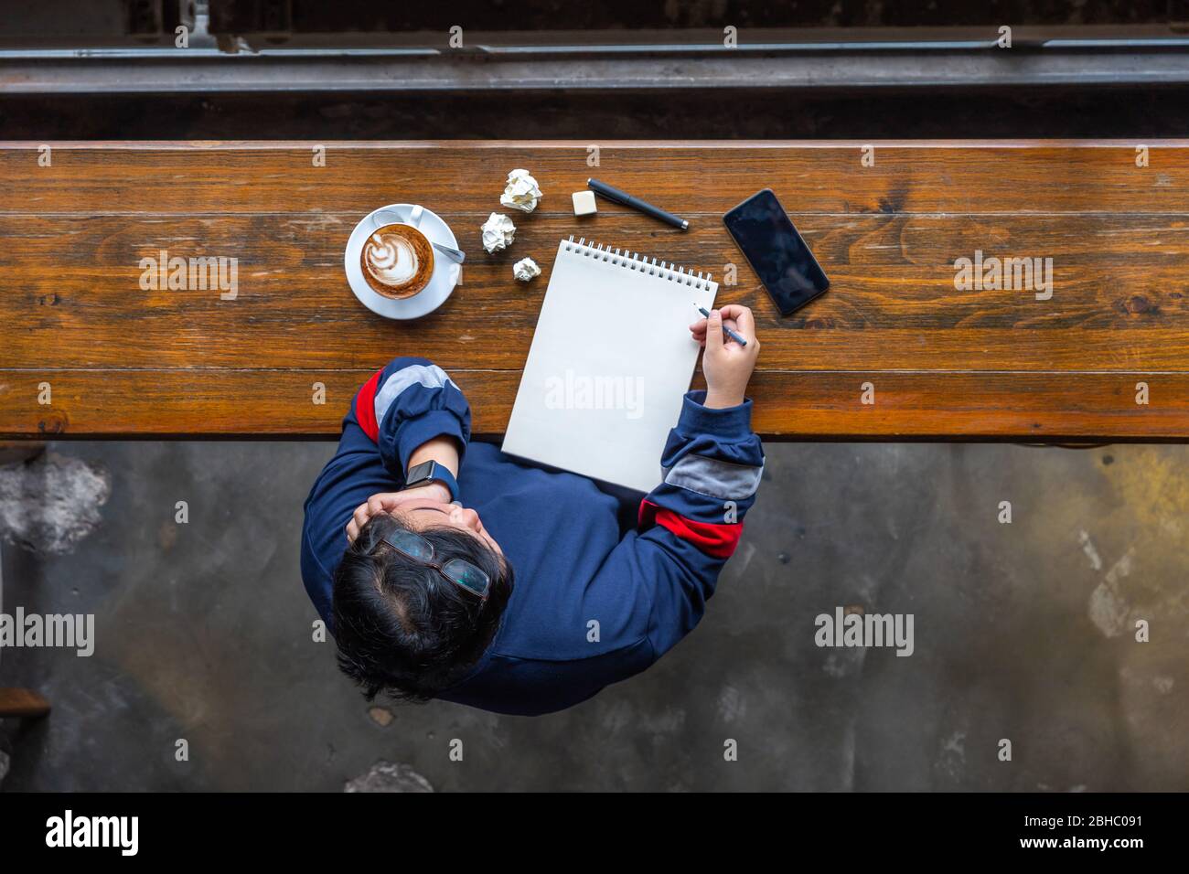 Asian woman stay home and draw on sketchbook Stock Photo - Alamy