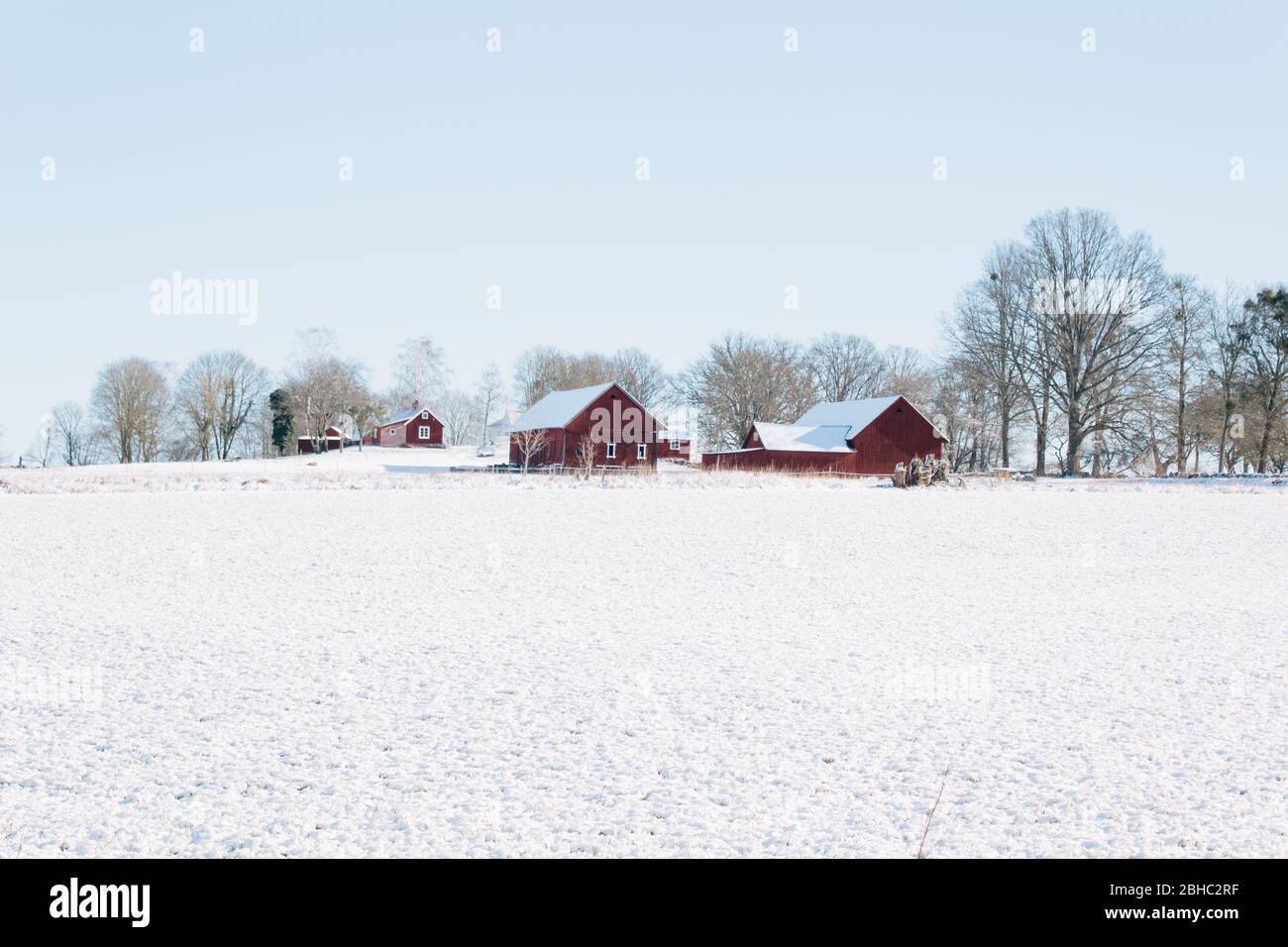 Typical red farm houses in the swedish winter wonderland Stock Photo ...
