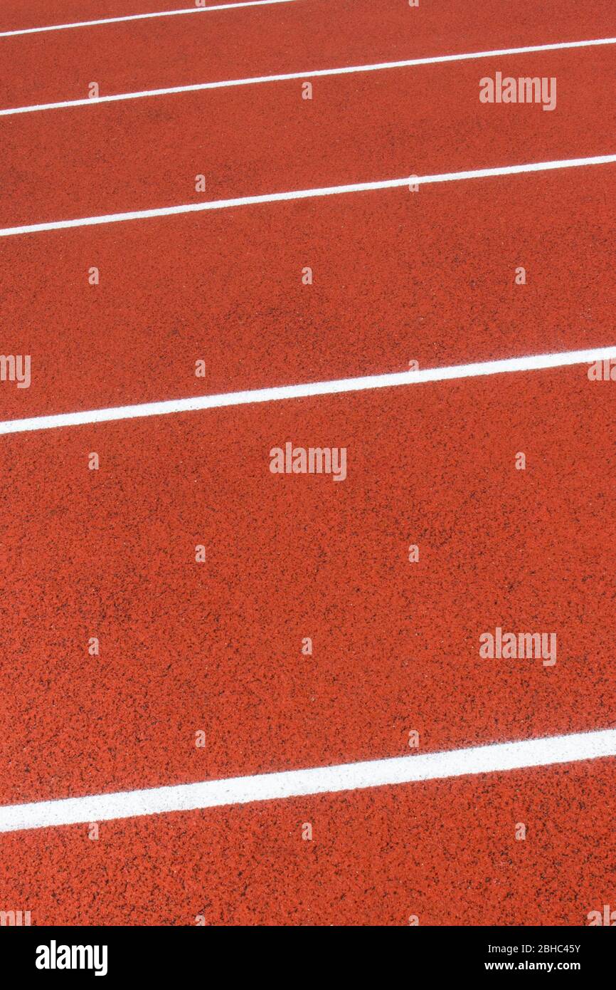 Red treadmill at stadium. Concept of healthy and sporty lifestyles ...