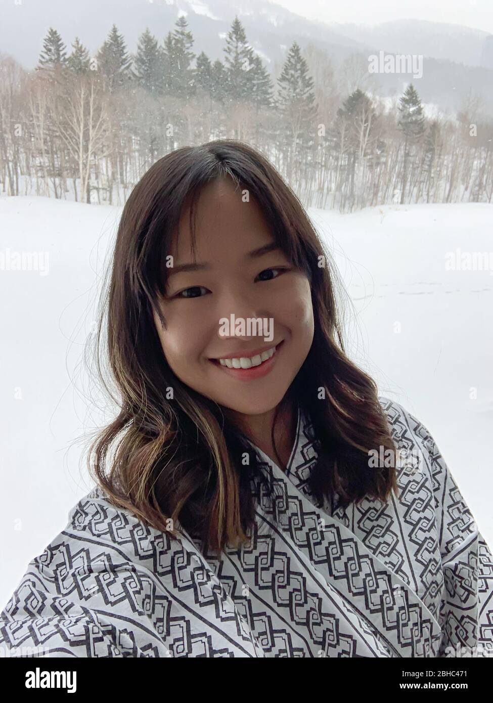 Young asian woman in traditional japanese pajama (jinbei) smiling ...