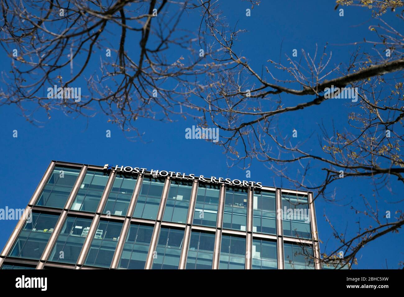 A logo sign outside of the headquarters of Host Hotels & Resorts in ...