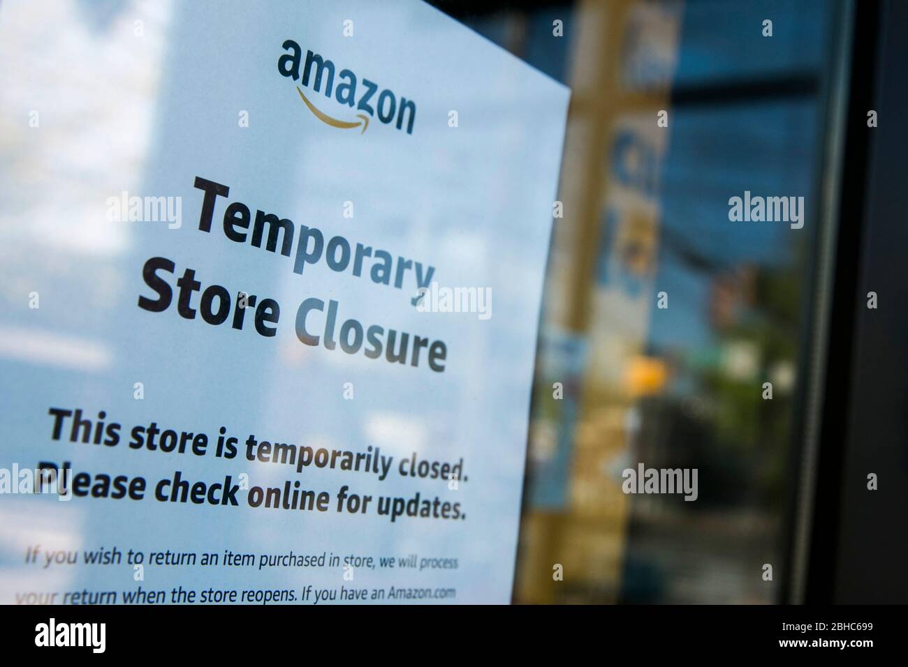 A sign informing customers a Amazon Books retail store is closed in ...