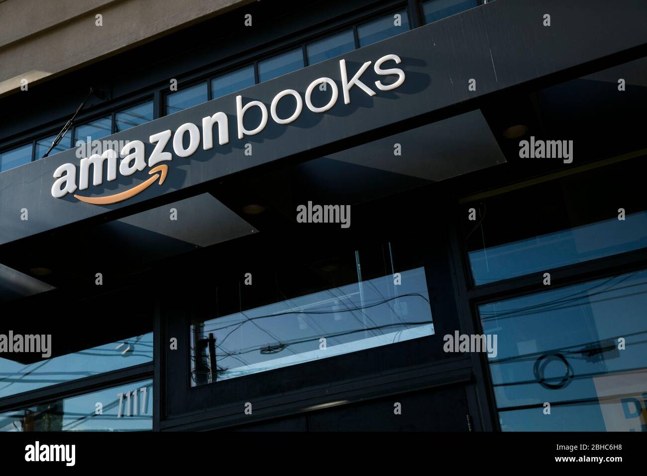 A logo sign outside of a Amazon Books retail store location in Bethesda ...