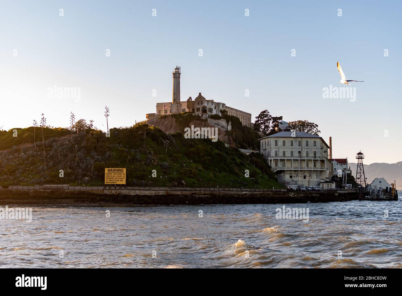 Lighthouse, barracks apartment and shipdock at Alcatraz Island Prison ...