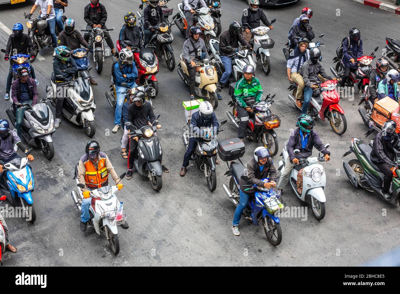 Many people drive motorcycles in hi-res stock photography and images ...
