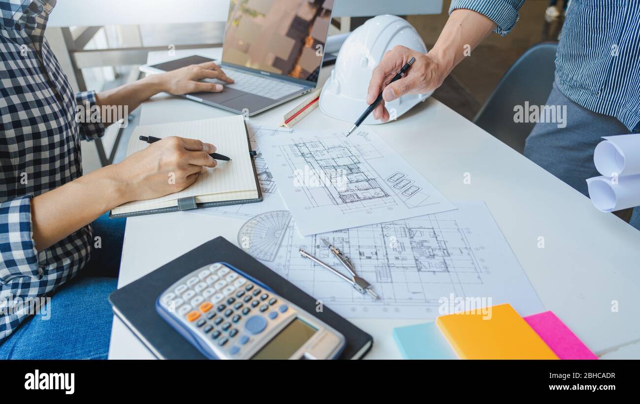 engineer Hand Drawing Plan On Blue Print with architect equipment ...