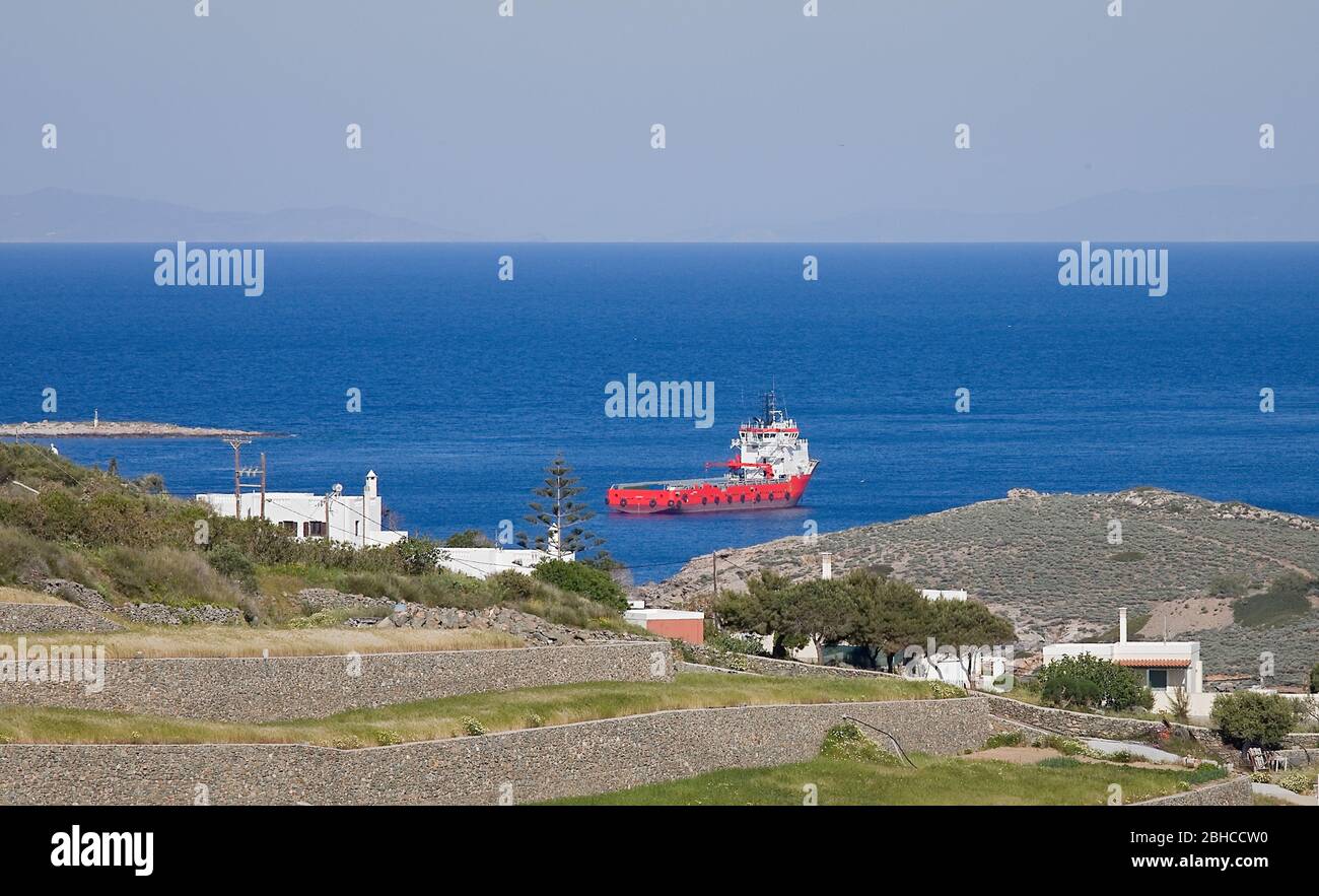 Small Cargo ship parked on the coast of a Greek island in the ...