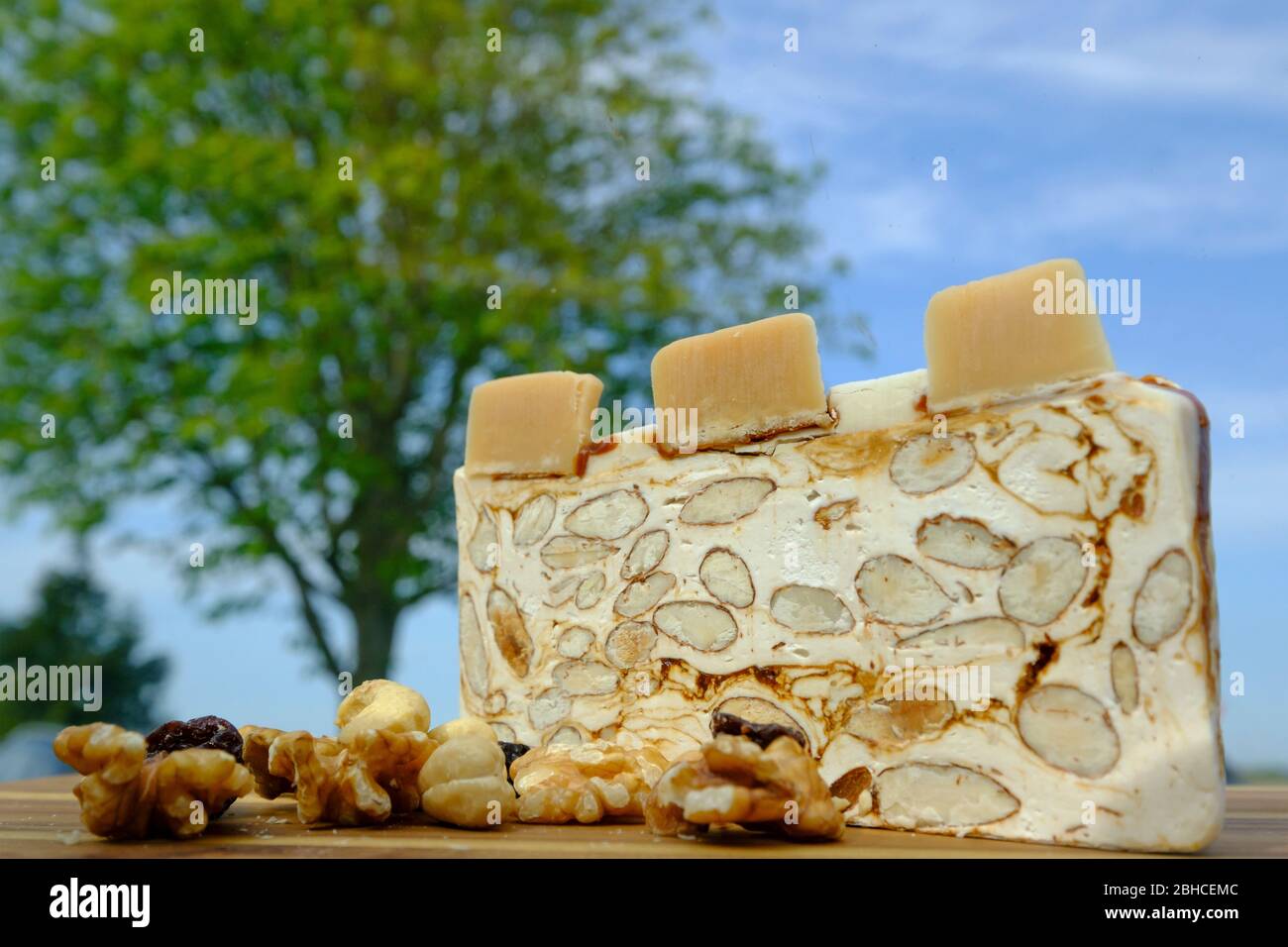 Delicious traditional large Italian chunk or nougat with nuts, walnuts ...
