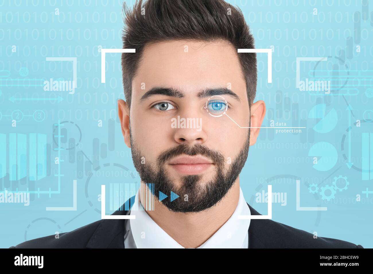 Young businessman using facial recognition system for data protection ...