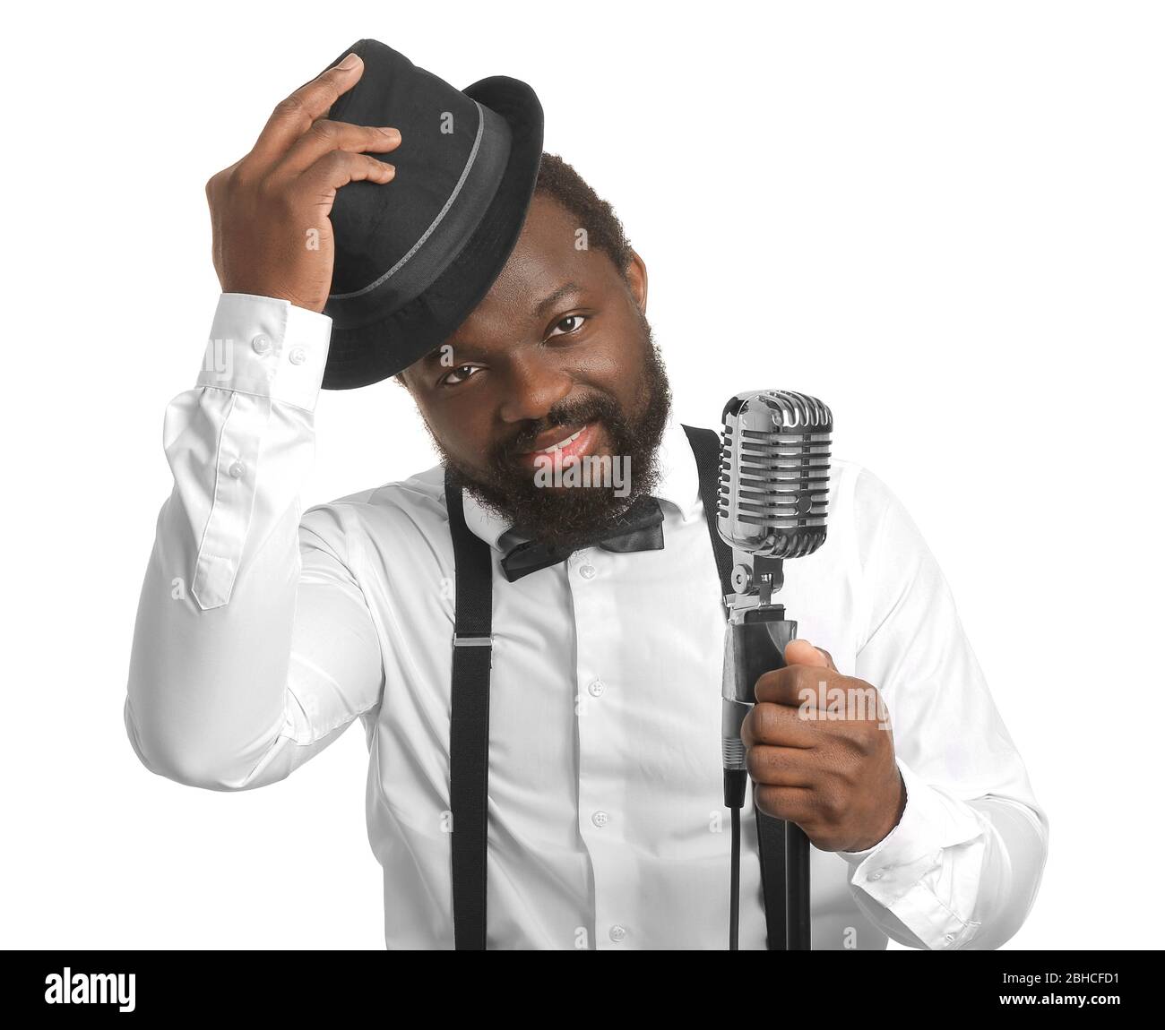 Male African-American singer on white background Stock Photo - Alamy