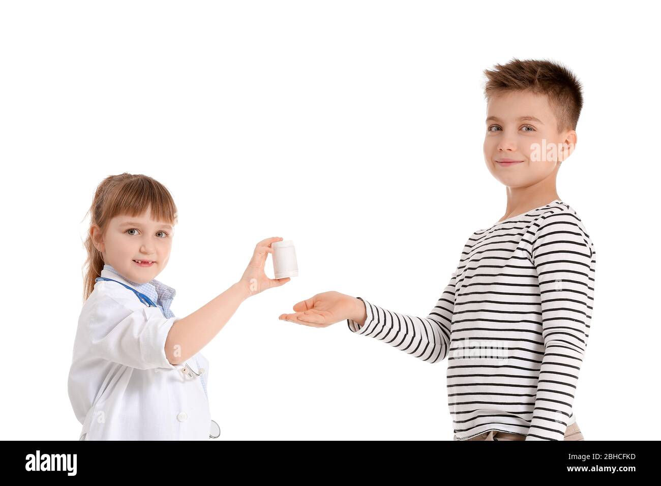 Cute little doctor with patient on white background Stock Photo - Alamy